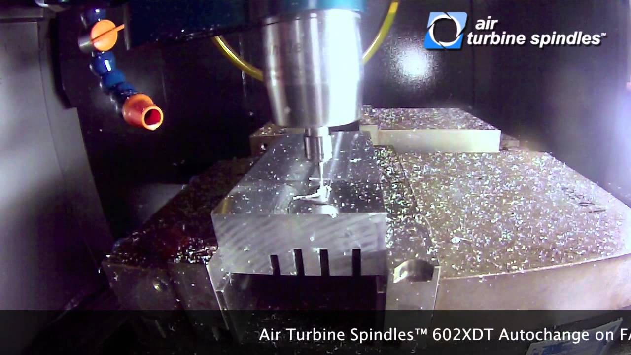 Air Turbine Spindles™ 602XDT loads automatically and mills on a Fanuc ...