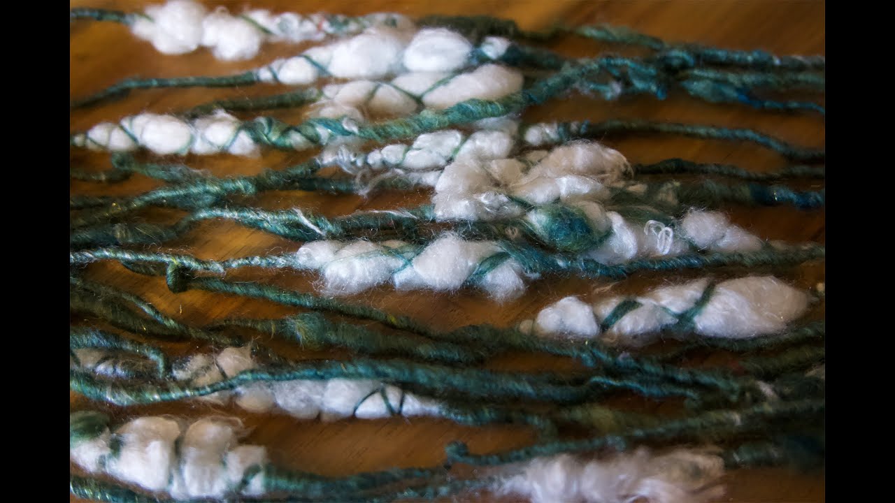 Corespinning a Yarn with Silk Lap add ins - YouTube
