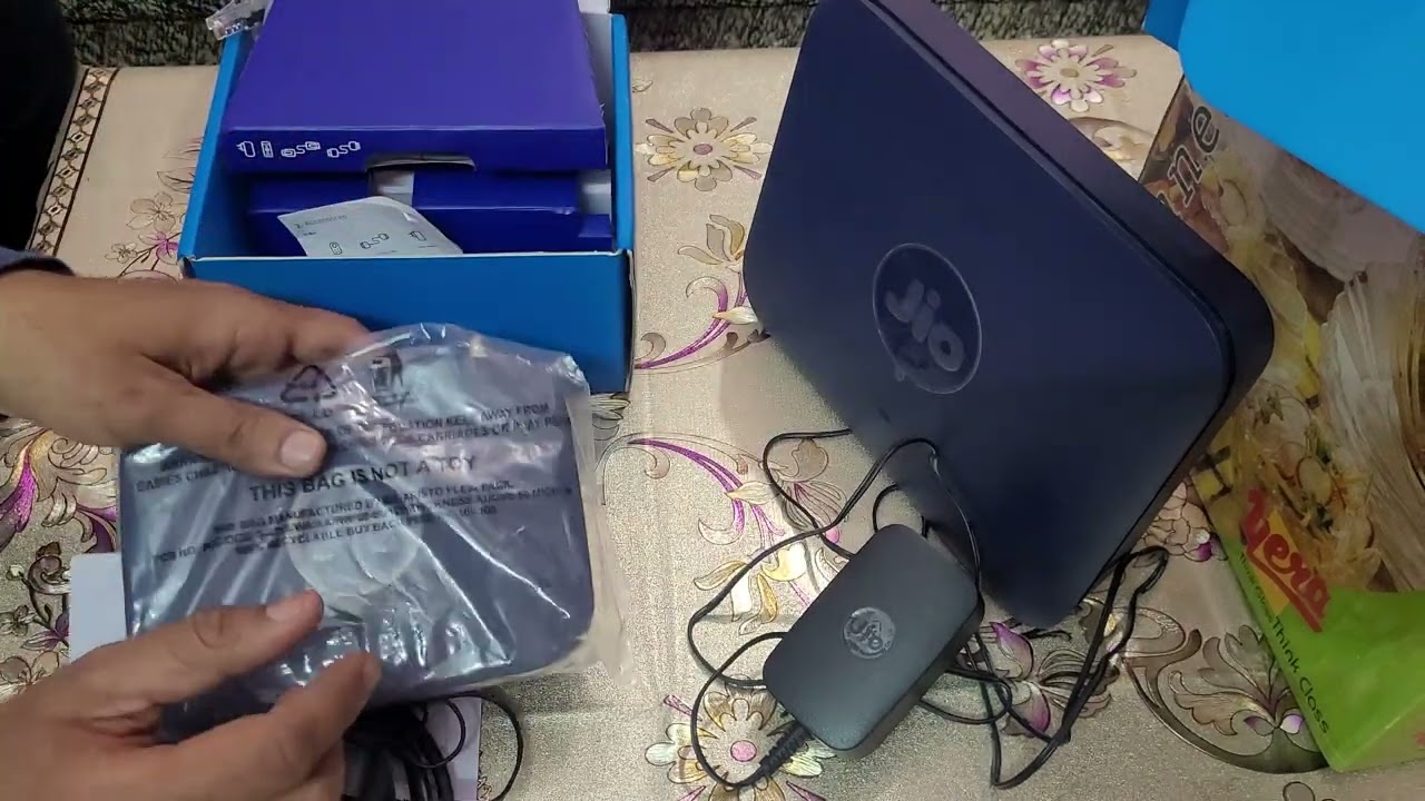 jio fiber unboxing again returning, and small demo of set top box - YouTube