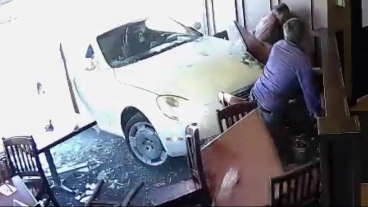 Psychic eating at restaurant hit by car - YouTube