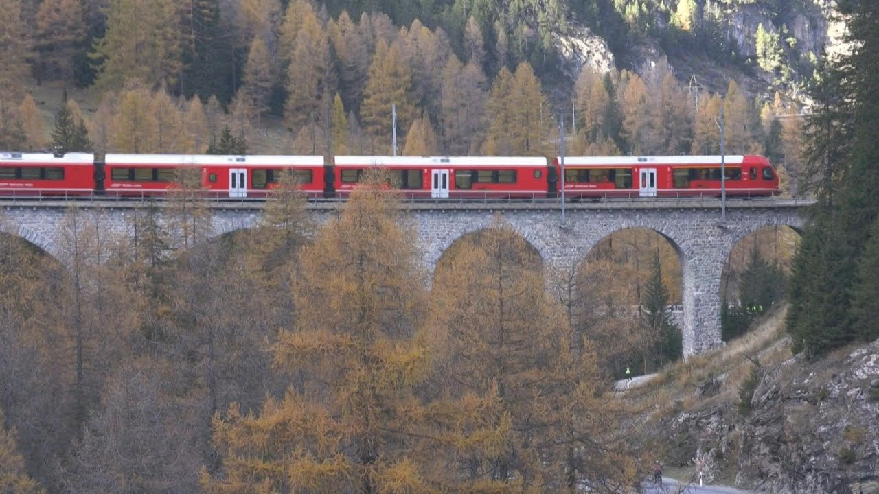 World's longest passenger train winds through Swiss Alps | AFP - YouTube