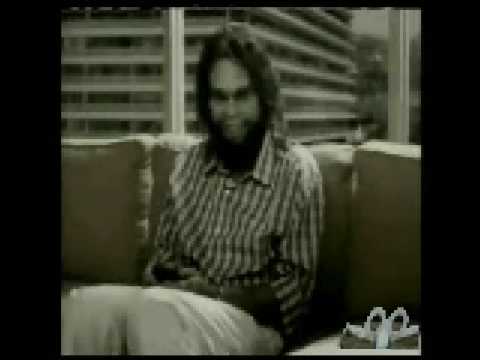 Geico cavman meets stack of money - YouTube