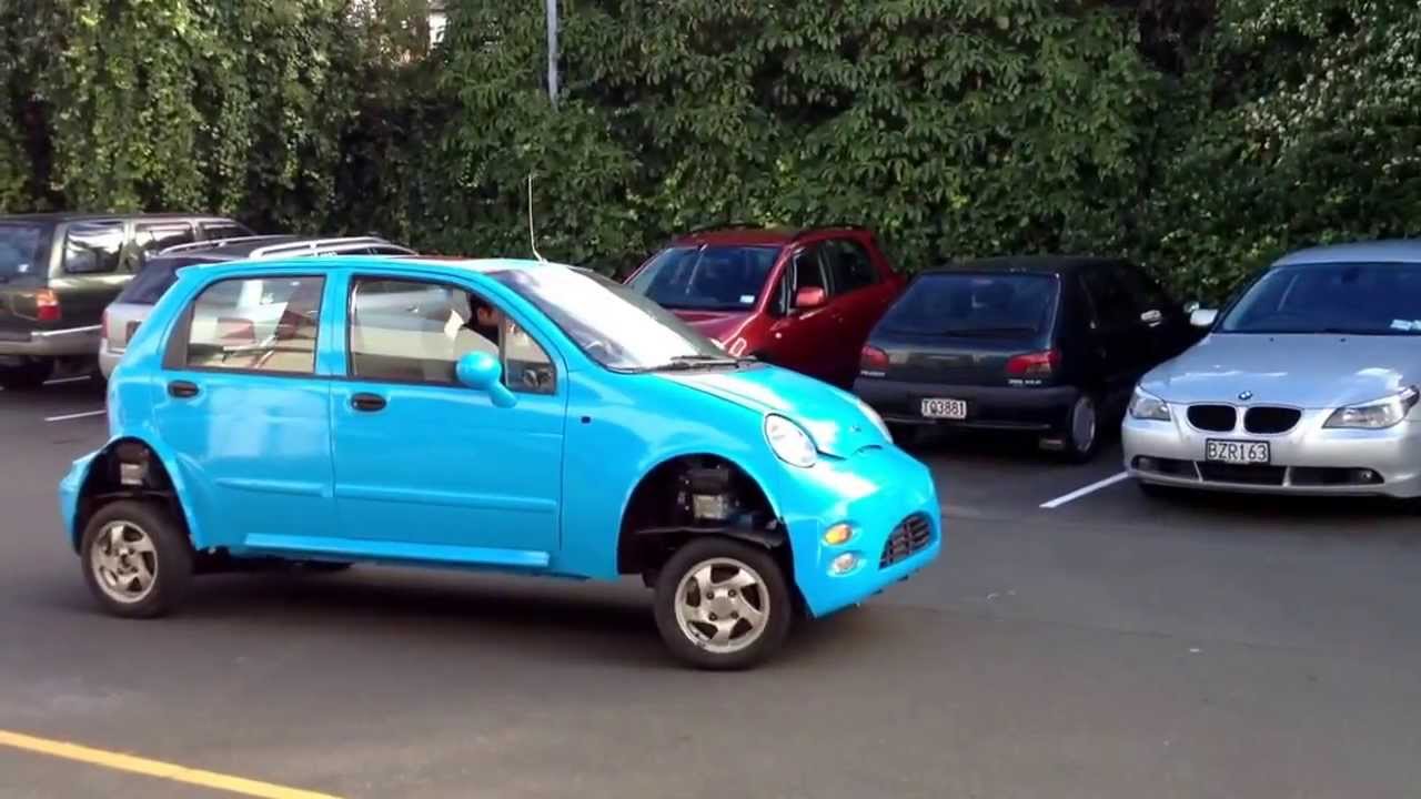 Electric Vehicle with a Four In-wheel-motor Drive and All-wheel ...
