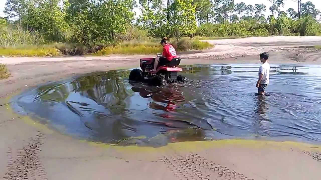 Redneck mower, mudding mower, lifted mower. - YouTube