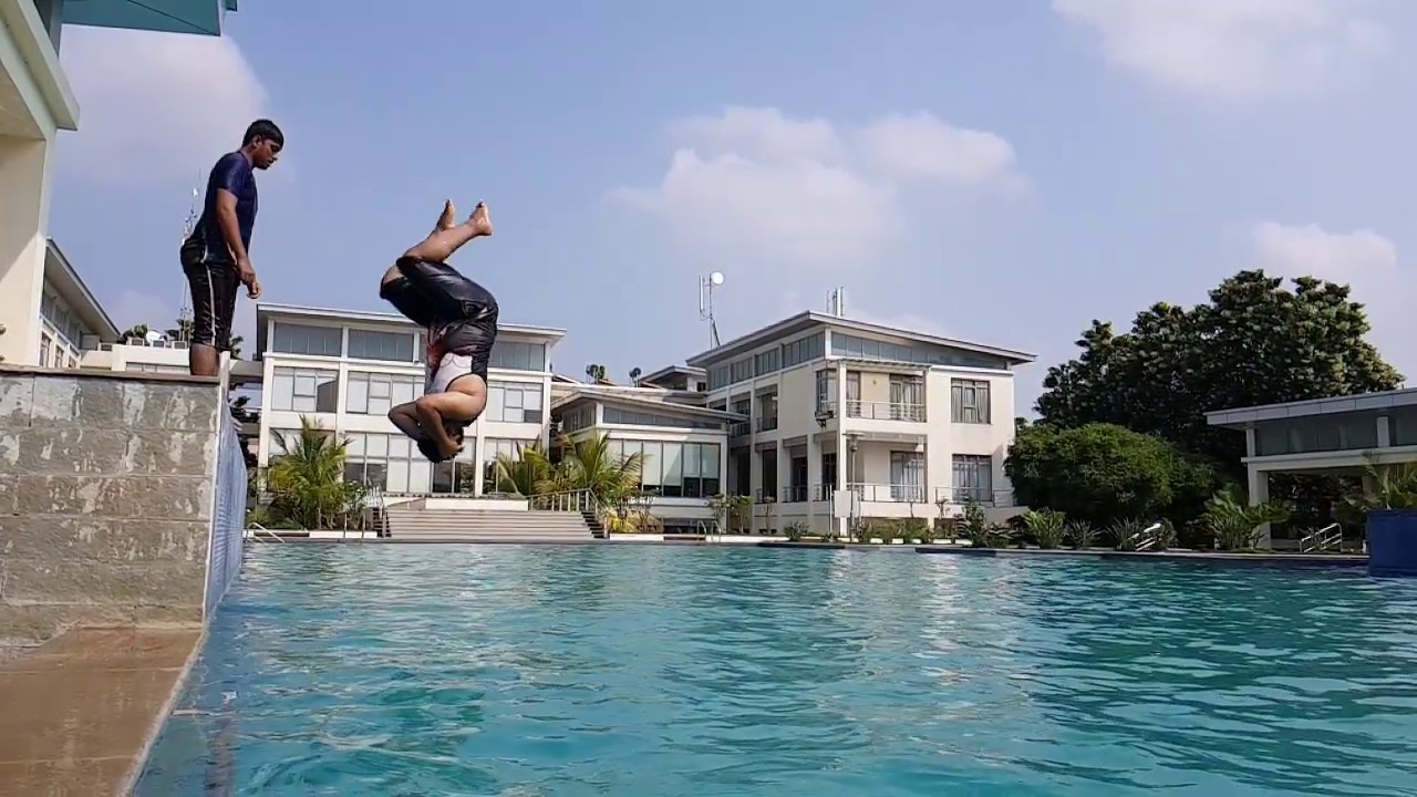 backflips in the swimming pool. - YouTube
