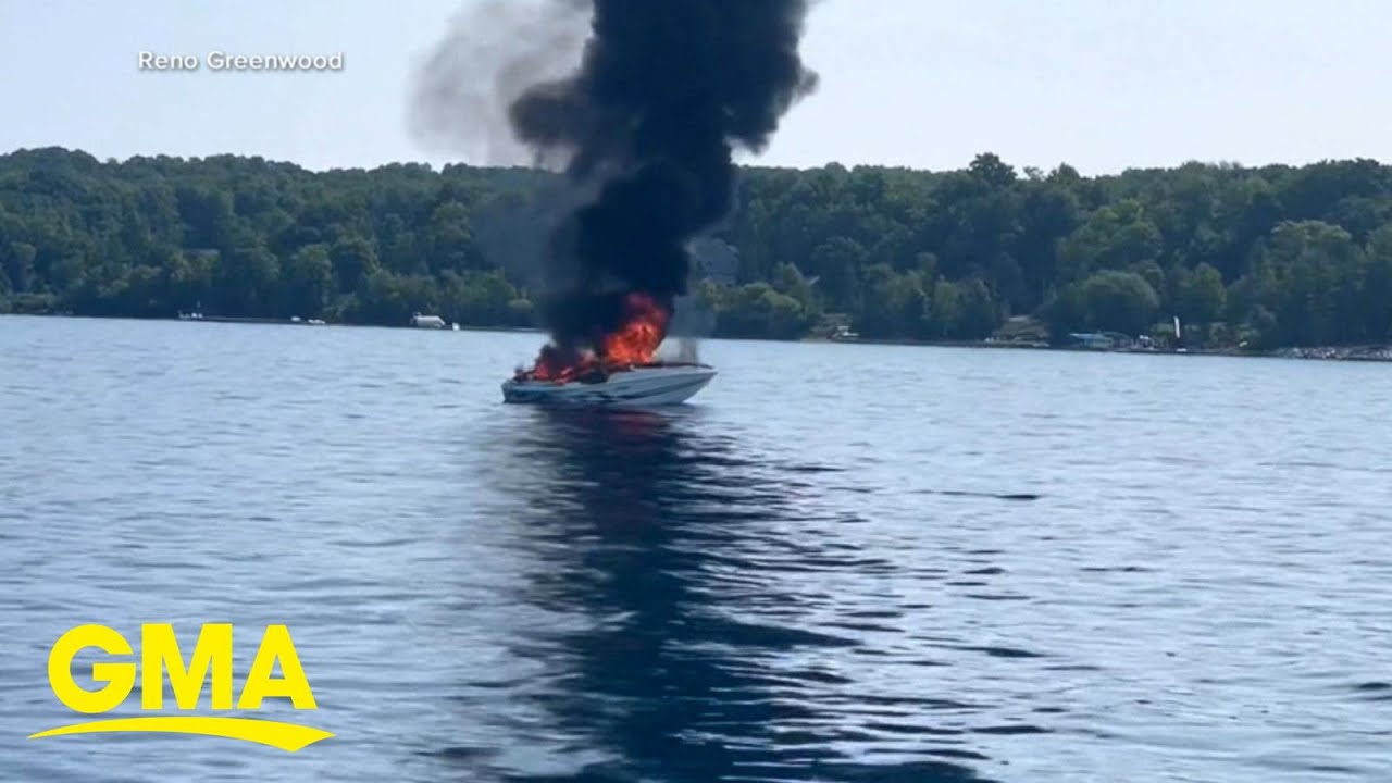 Family saves 2 people as their boat was engulfed in flames | GMA - YouTube