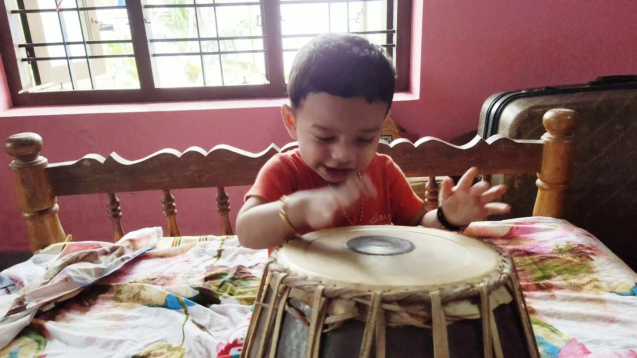 Rithu kuttan playing tabala - YouTube