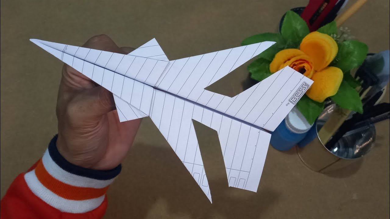 Paper plane - How to make a JET FIGHTER paper airplane that fly far ...