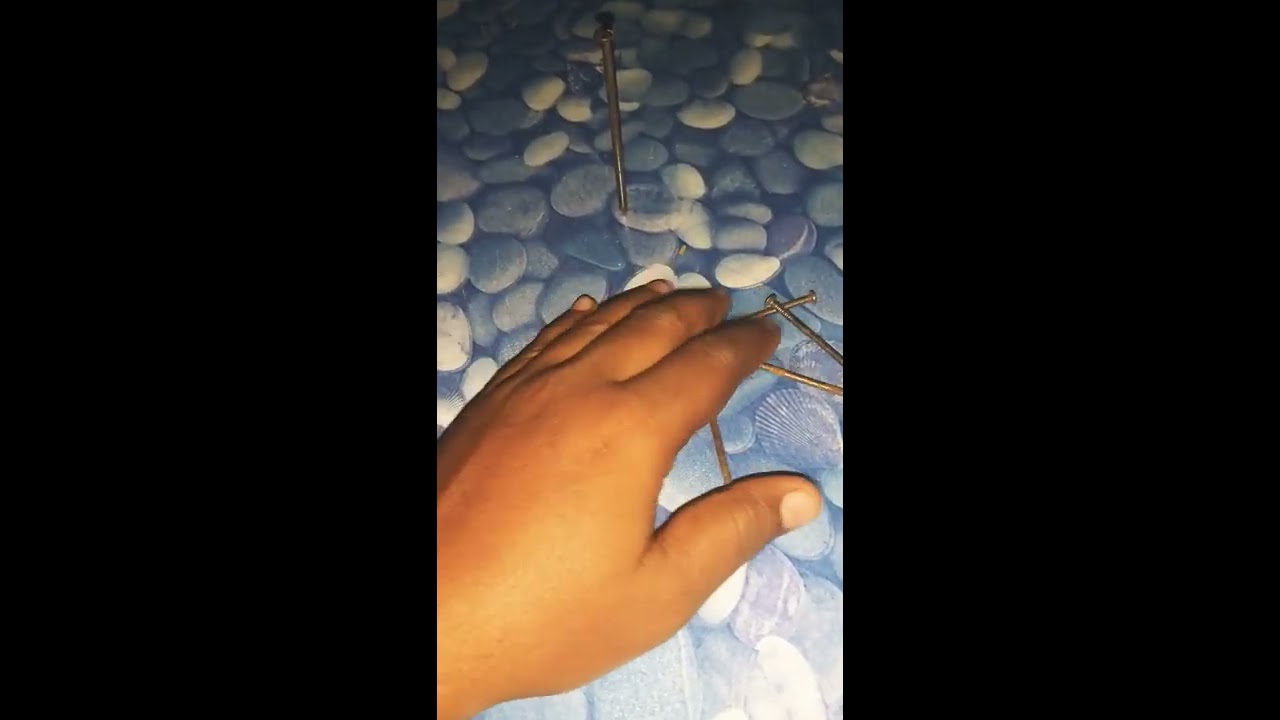 Six nails floating on one nail - YouTube