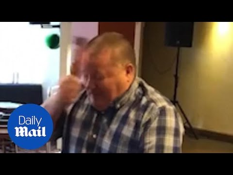 Man hilariously fails in attempt to break bottle on his head - YouTube