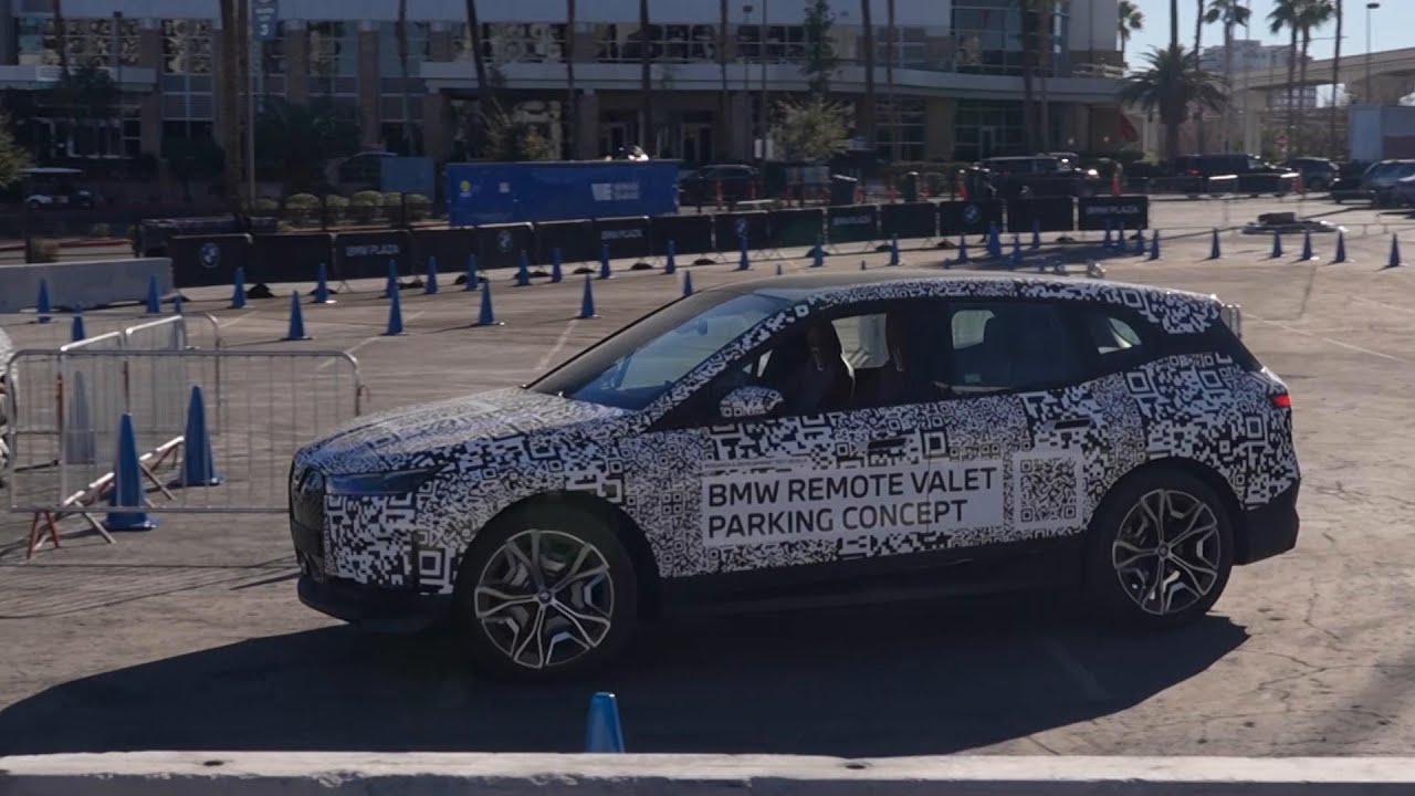 BMW showcases remote valet parking at CES - YouTube