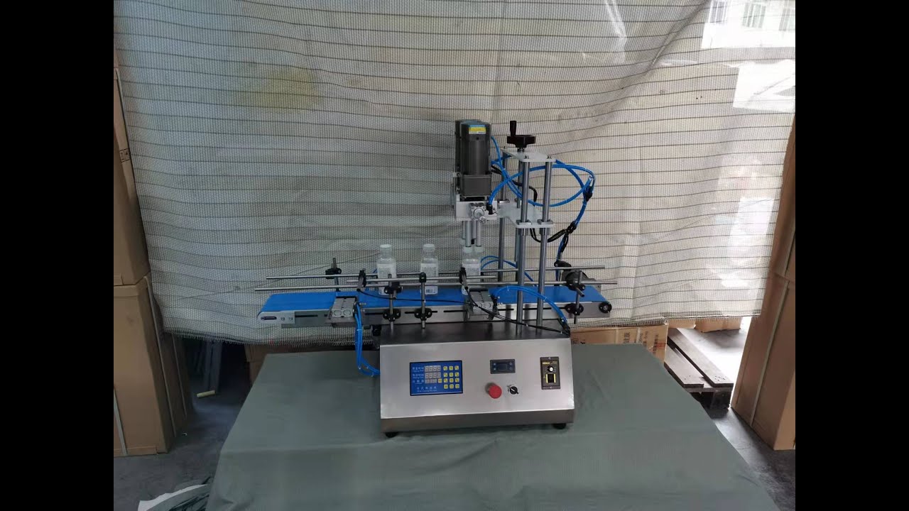 Fully automatic 4 small wheel capping machine - YouTube