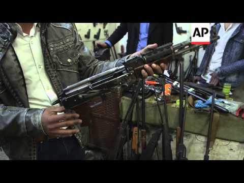 Business brisk for Kurdish gunsmith in Iraq - YouTube