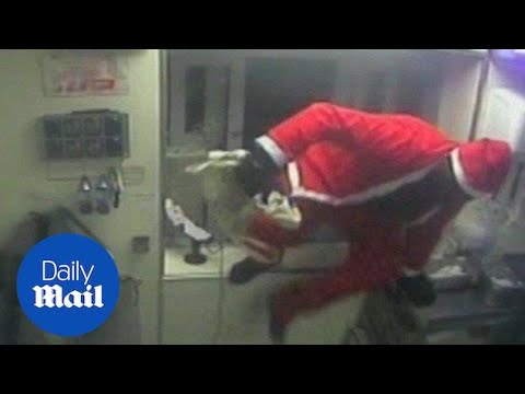 CCTV shows man dressed as Santa robbing a KFC in Derby - Daily Mail ...