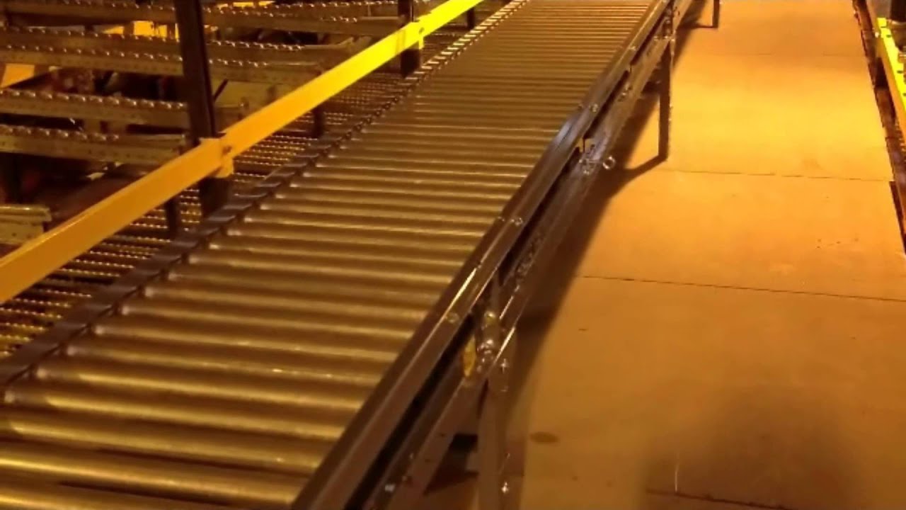 USED PALLET FLOW CONVEYOR: Using Rails Pallet Moves Down to Unloading ...