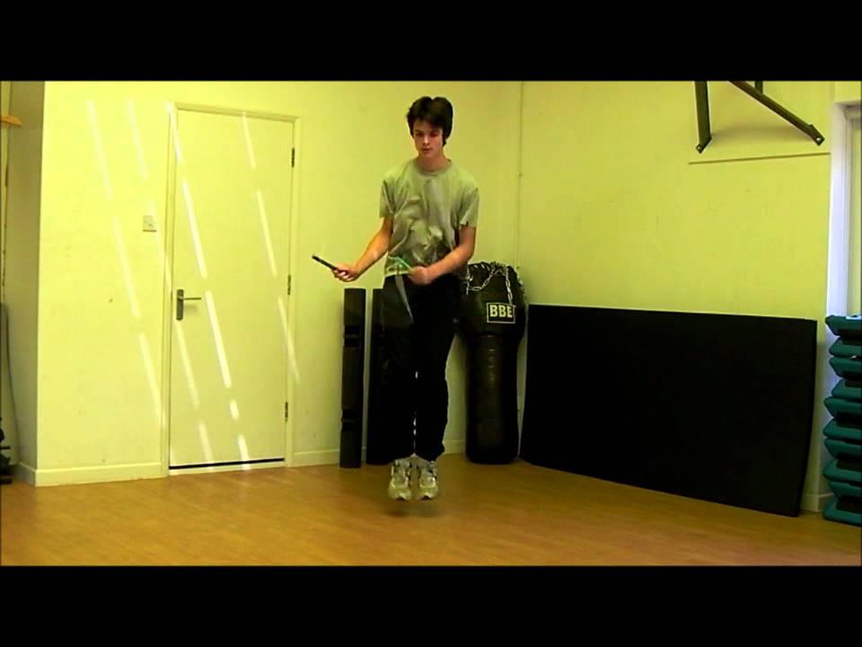 Backwards swing cross double jump rope trick slow motion - YouTube