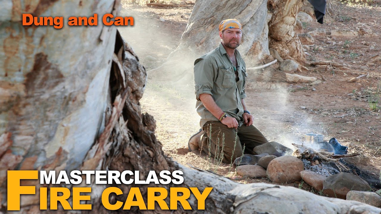 Survivorman | Masterclass | Fire Carry with Dung and Can - YouTube