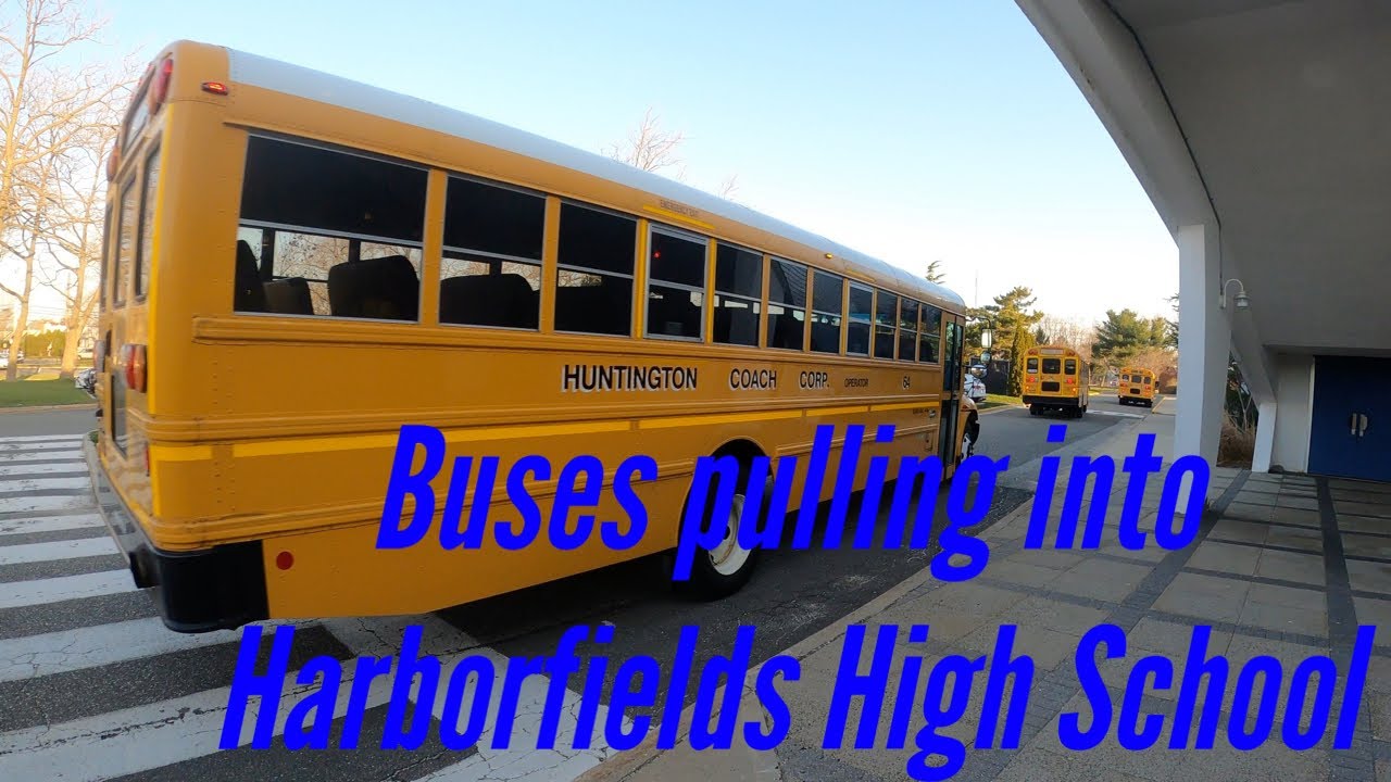 Buses pulling into Harborfields High School - YouTube