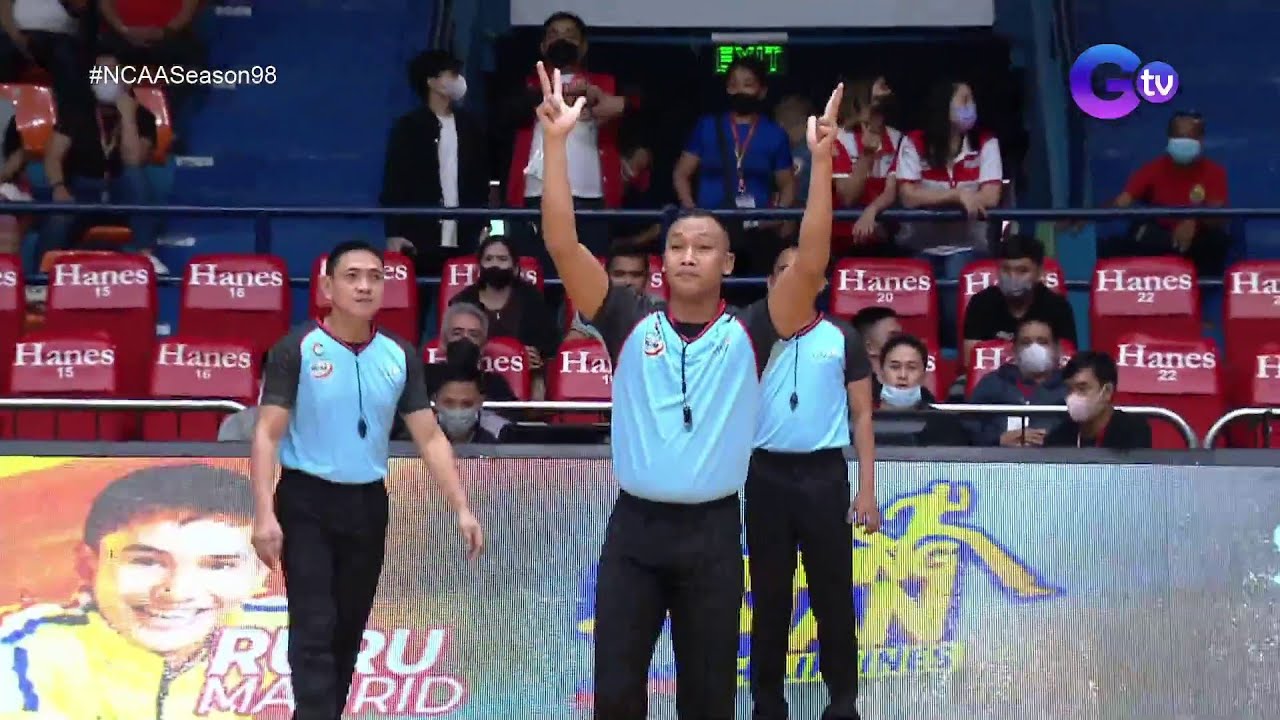 Ralph Robin beats the 1st quarter buzzer to give EAC a 16-15 lead over ...