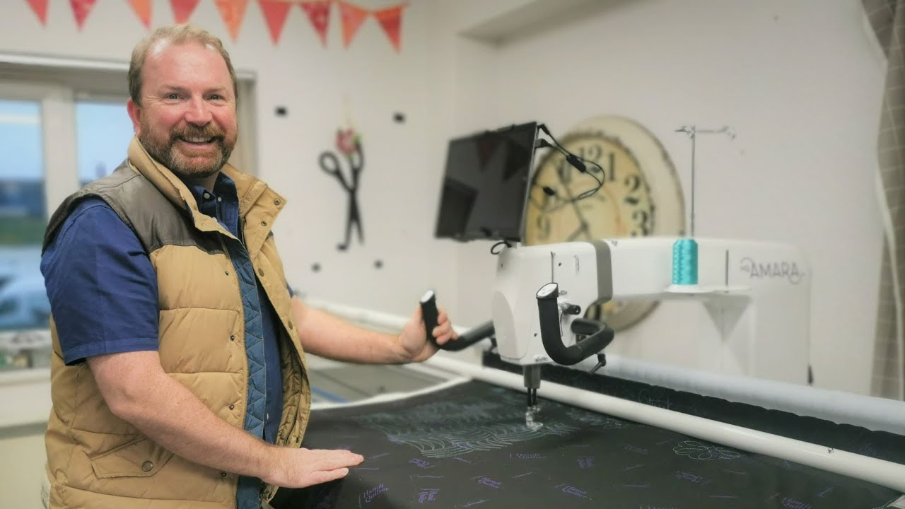Stuart Hillard, Handi Quilter Ambassador, stitching out a design on his ...