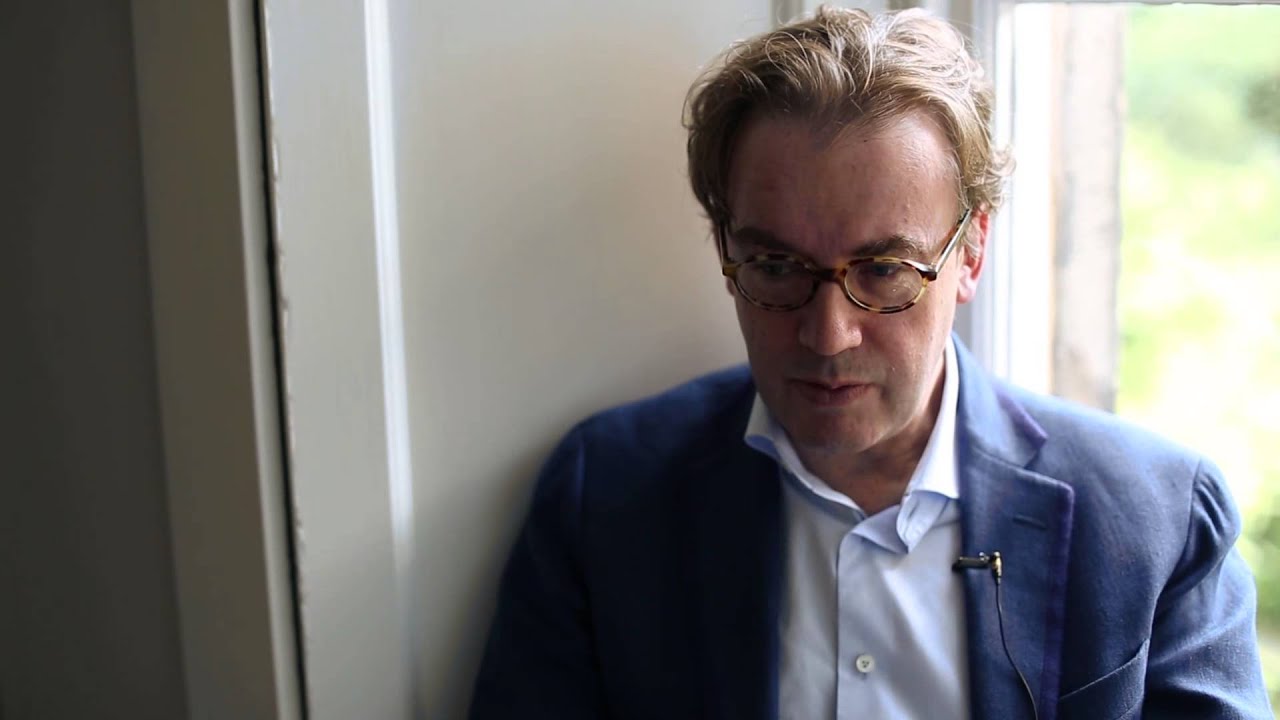 A portrait of Sir Jonathan Mills - YouTube