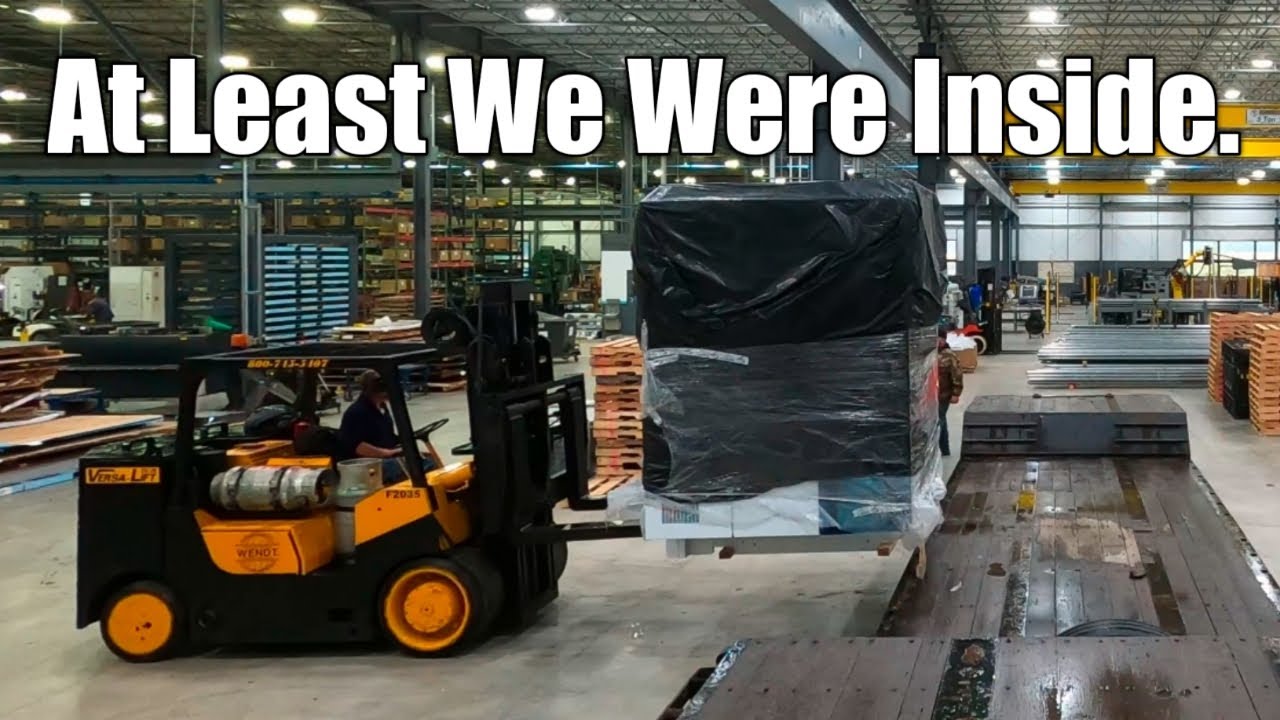 Unloading CNC Machine From Cabover Peterbilt - YouTube