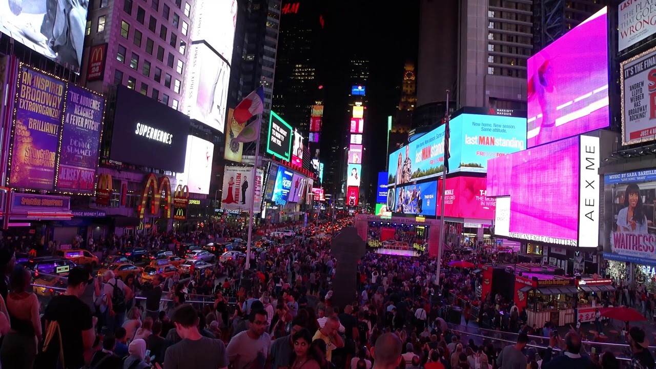 Standing at the Top: The TKTS Broadway Ticket Booth in Times Square ...