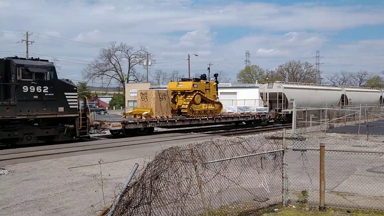 LONG Norfolk Southern push/pull with a Caterpillar Bulldozer and Mixed ...