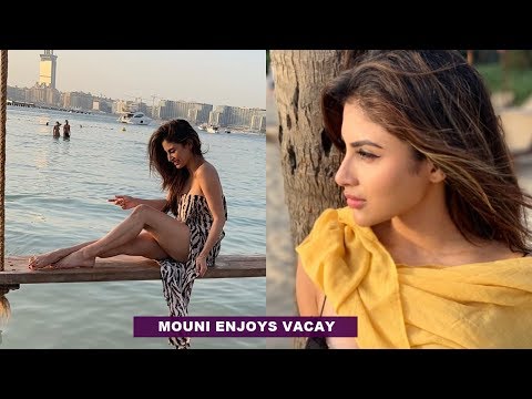 Mouni Roy flaunts her perfect curves as she beats the heat in a pool