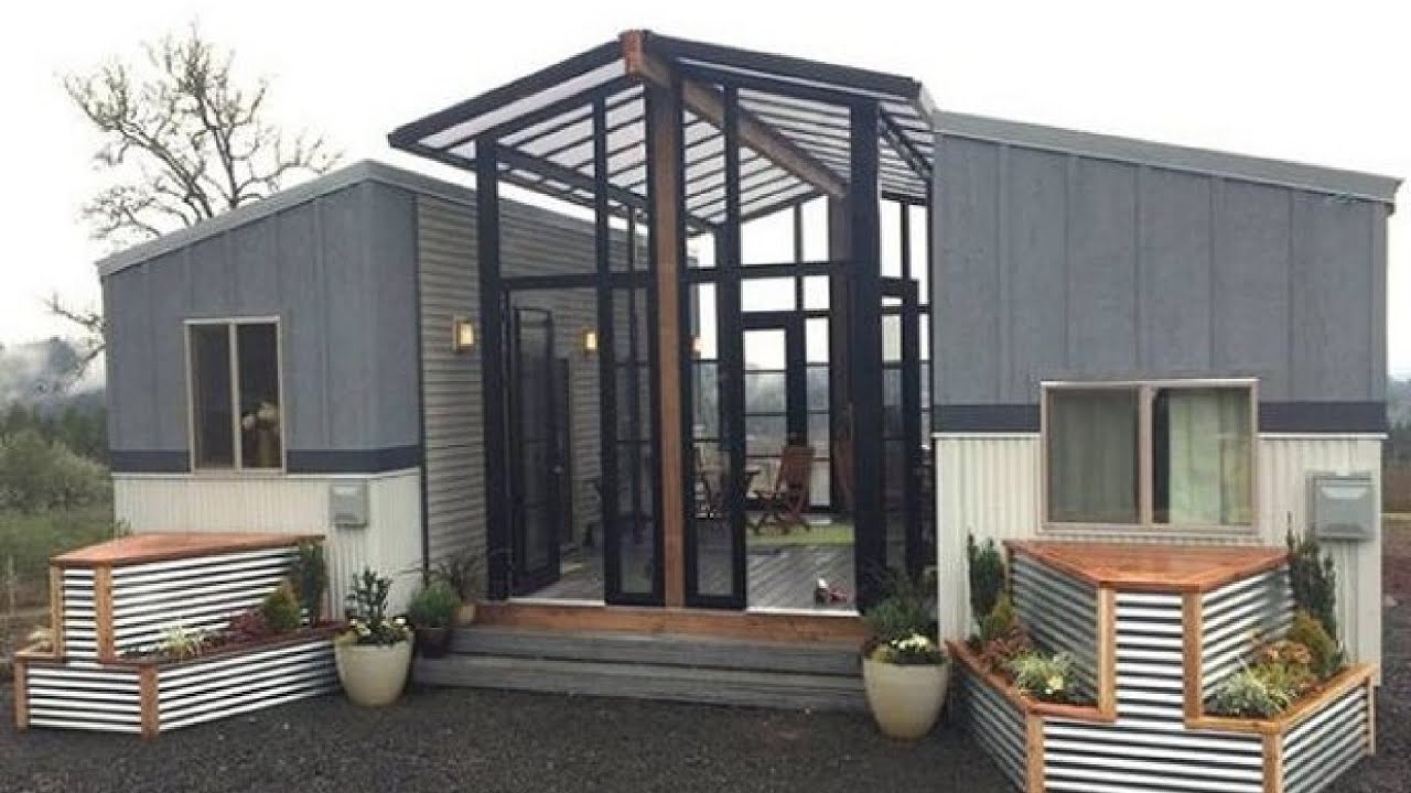 Amazing Two Tiny Houses Connected With A Central Sun Room And Deck ...
