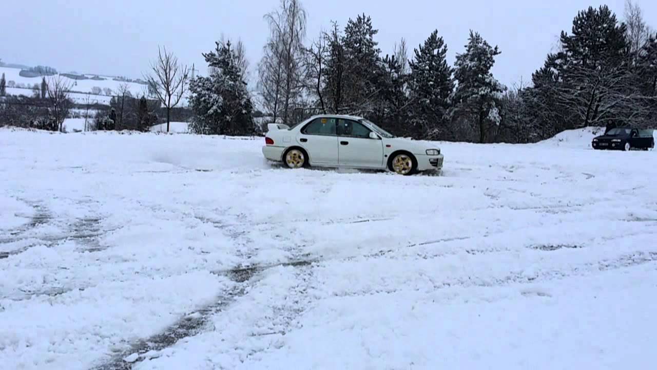 subaru impreza gt and sti in snow - YouTube