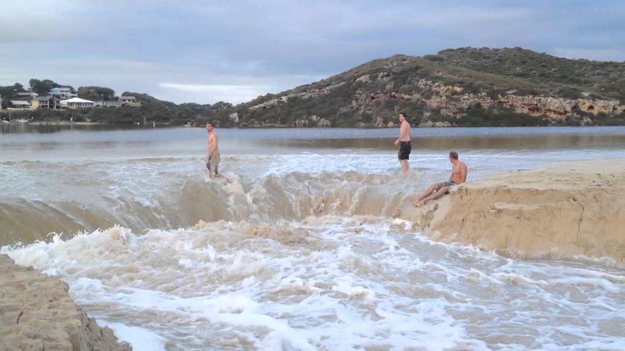 Guys Body Surf when Moore River Bursts its Banks - YouTube