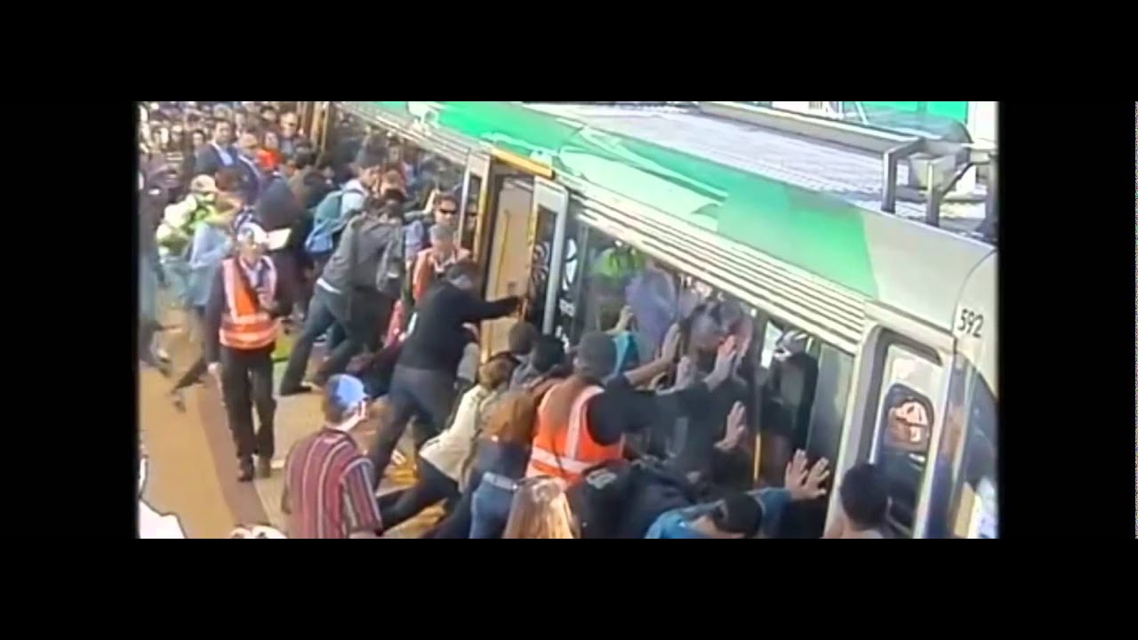Australia Dramatic footage! Passengers pushing train back and forth to ...