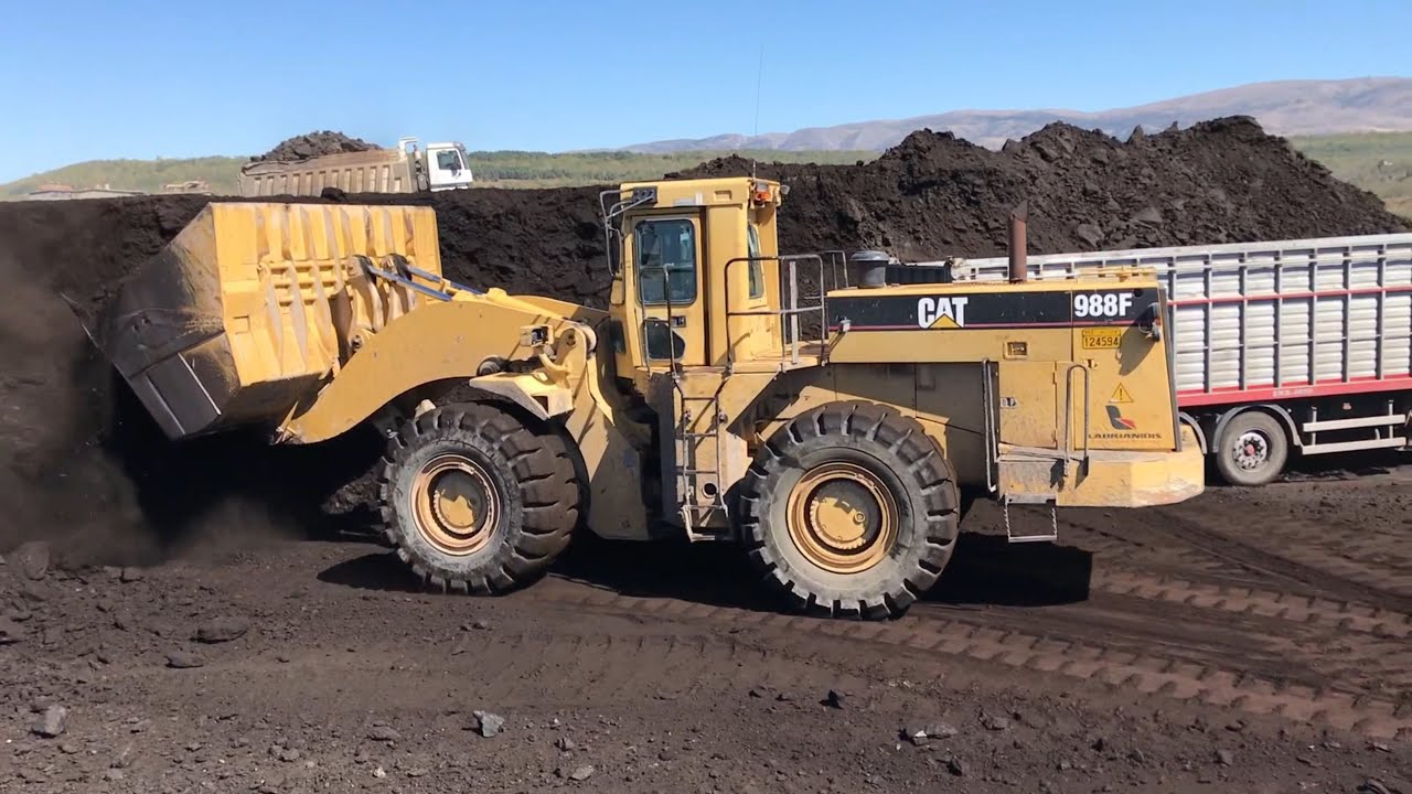 Caterpillar 988F Wheel Loader Loading Coal On Trucks - Kivos Ate - YouTube