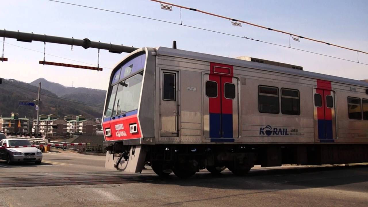 Korail Line 1 train passing the Soyo Railway Crossing - YouTube