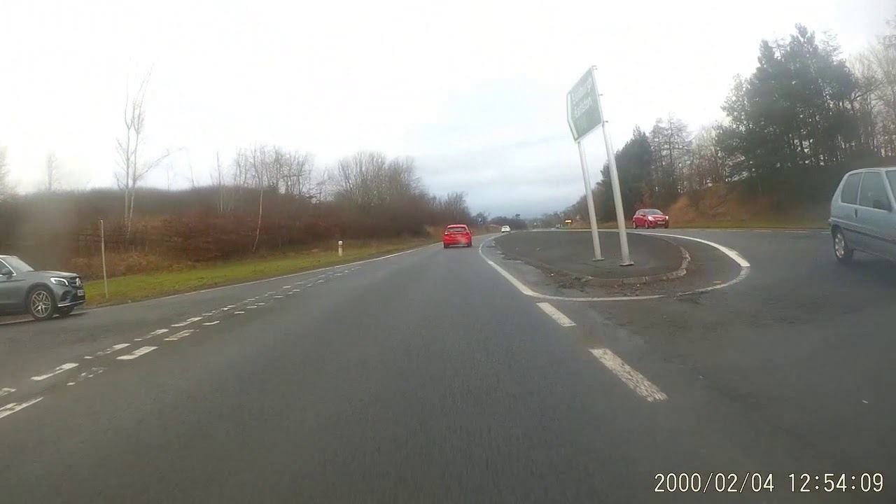 Road layout and emerging car - YouTube
