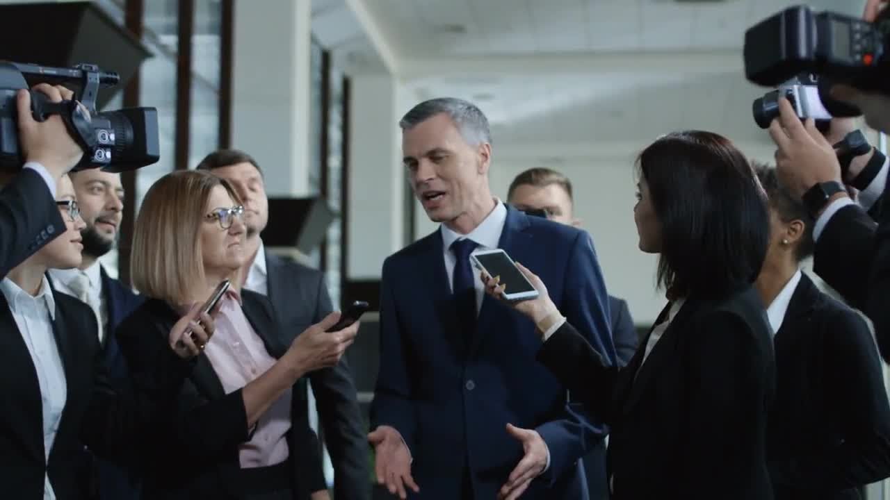 Politician Talks To Journalists Stock Video - YouTube