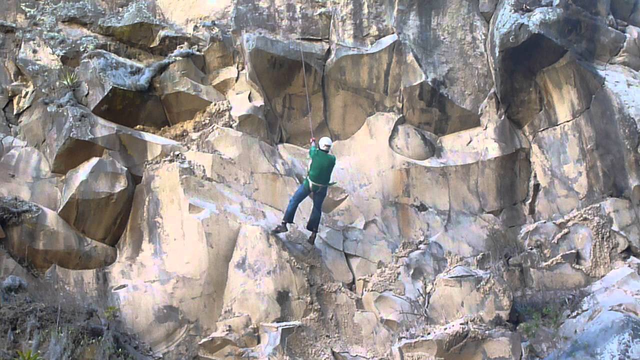Repelling down a cliff in Ecuador - YouTube