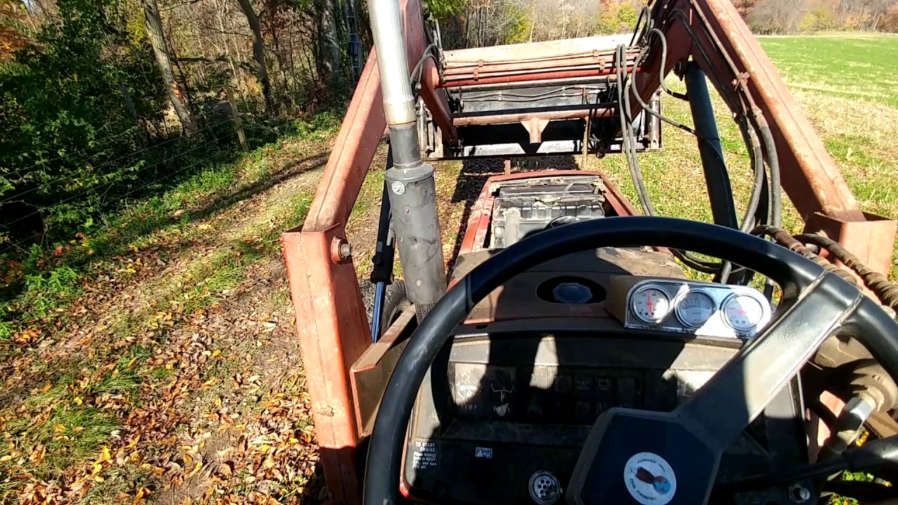 Pulling t-posts fast (4 in 1 bucket) - YouTube