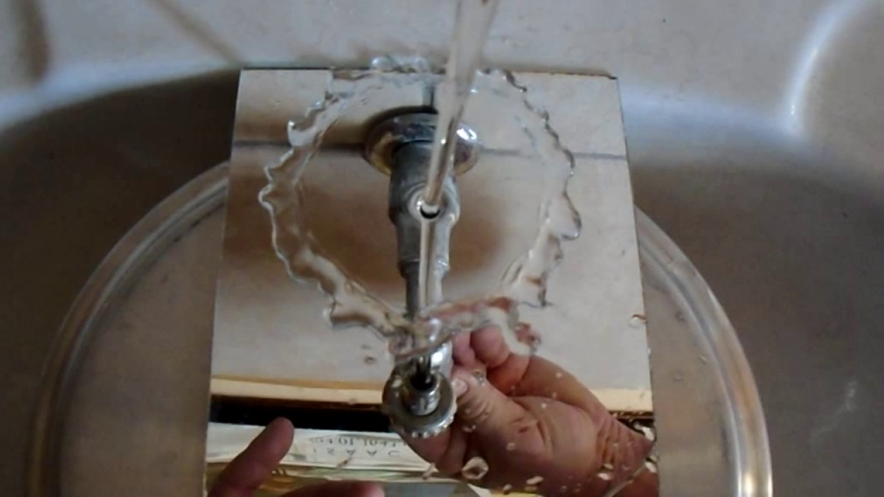 FORMATION (BY HIDRAULIC JUMP) OF THE CIRCULAR WATER-FLOW PATTERN IN A ...