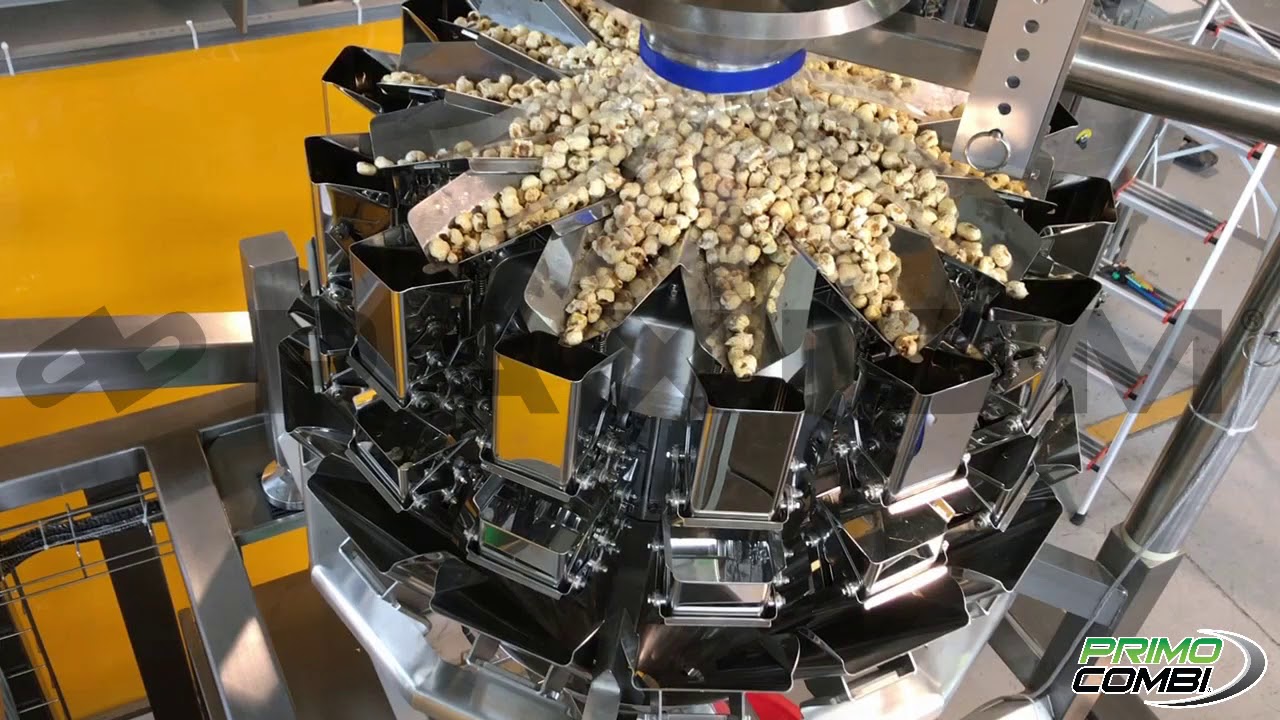 PrimoCombi® multihead weigher dispensing snack food into pre-made ...