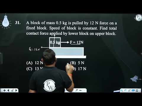 A block of mass 0.5 kg is pulled by 12 N force on a fixed block. Speed ...