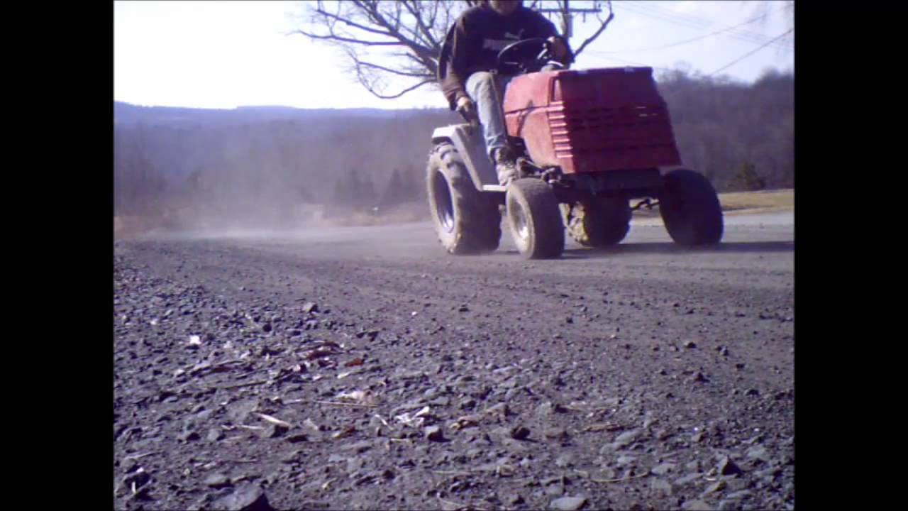 redneck wizard lawn mower vs quad #3 - YouTube