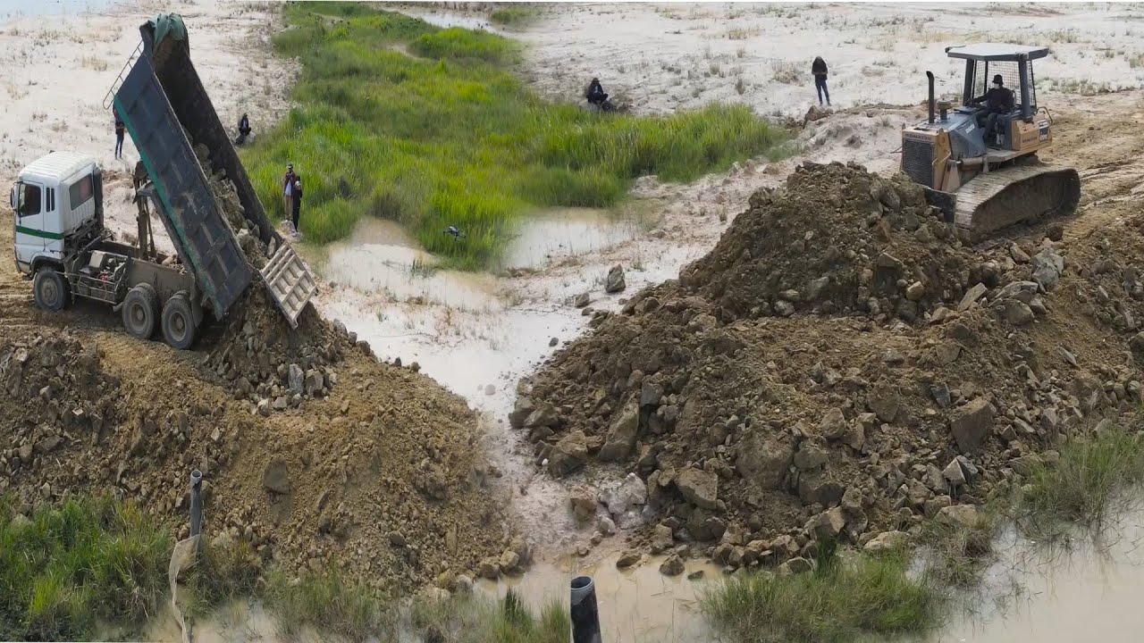 Excellent Dozer push Rock , Dirt with Heavy Dump Truck unloading Dirt ...