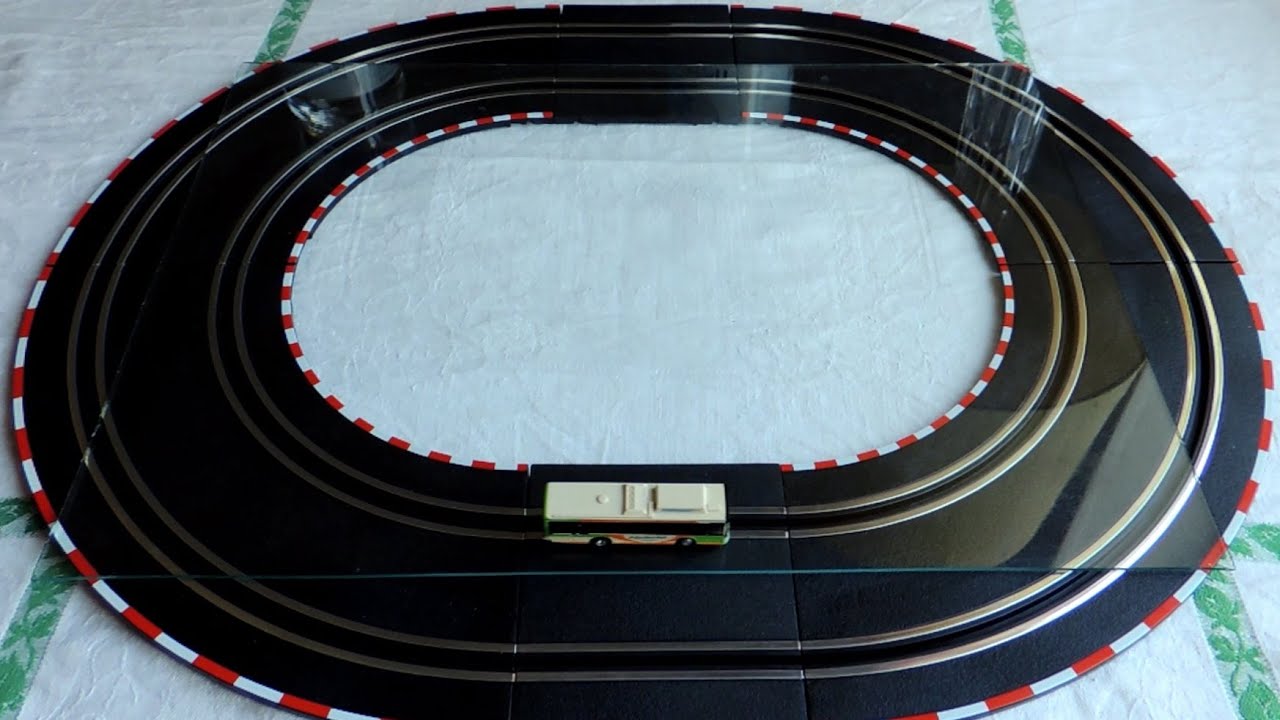 Test of Tomytec N scale Bus System on tracks from Carrera Go with a ...