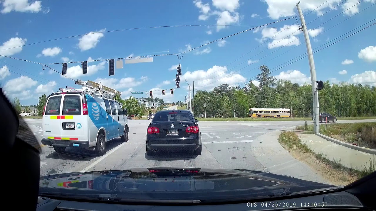 School bus runs red light! - YouTube