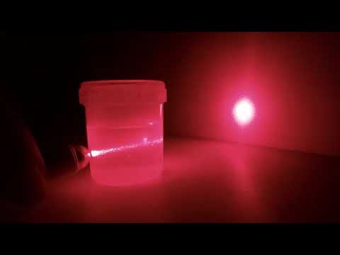Laser beam through water jar - YouTube