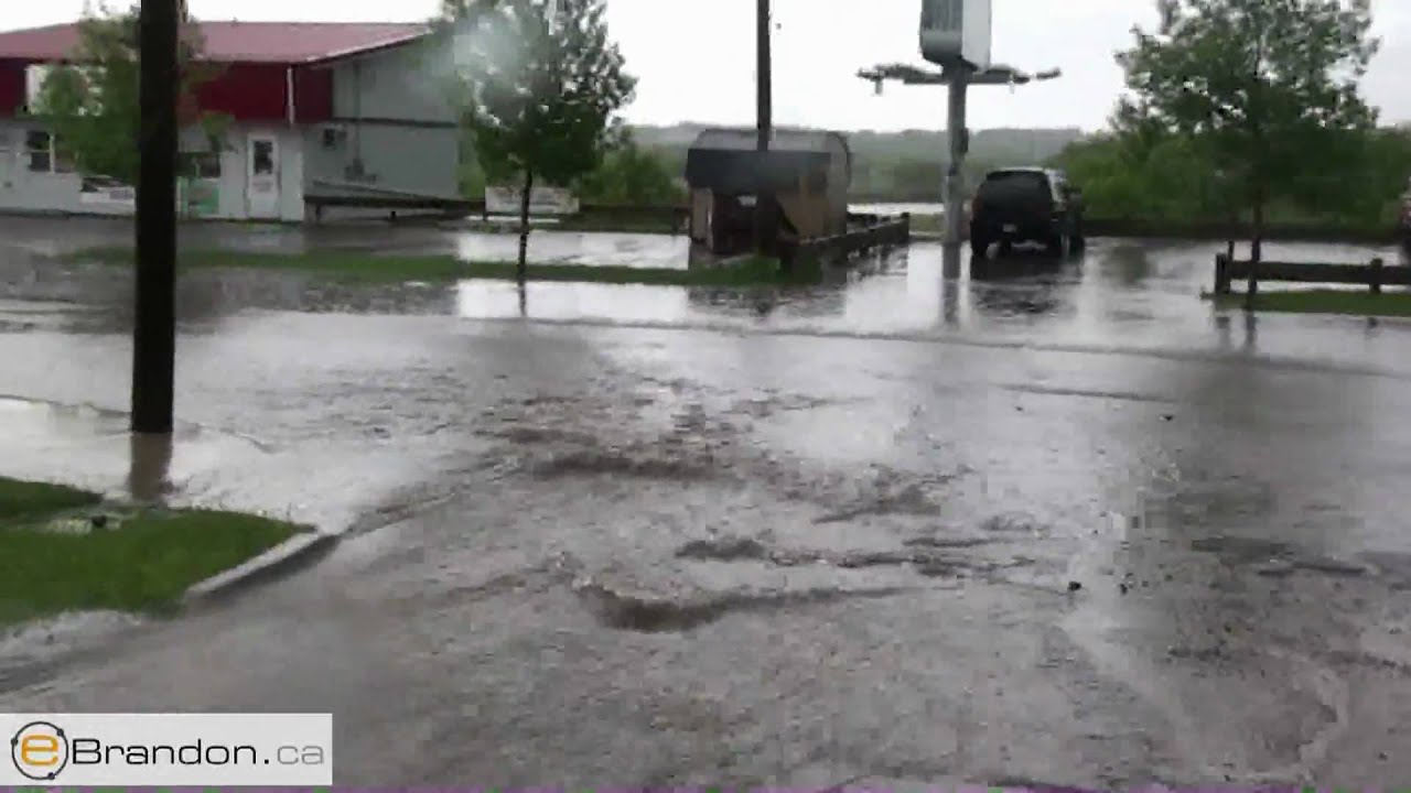 Street flooding after May 29/10 Brandon, MB storms - YouTube