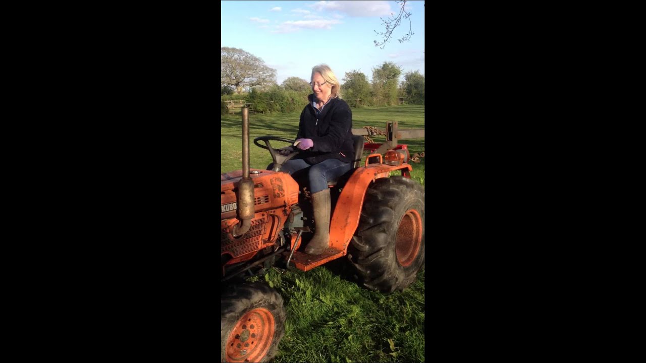 Kubota 8200 4WD Tractor Lady Driver Harrows Grassland - YouTube