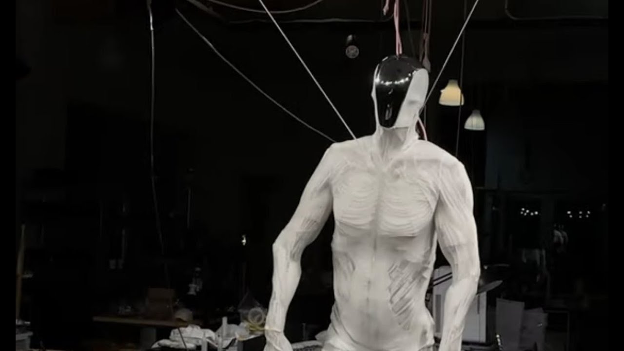 Humanoid 'Protoclone' Robot Twitches into Action While Hanging from ...